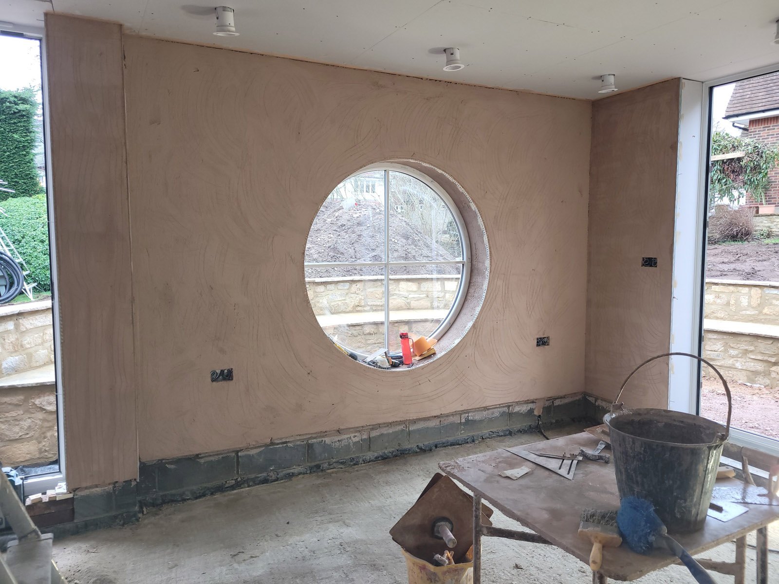 Plastering a Bullseye Window in Weybridge | Cheam Plastering